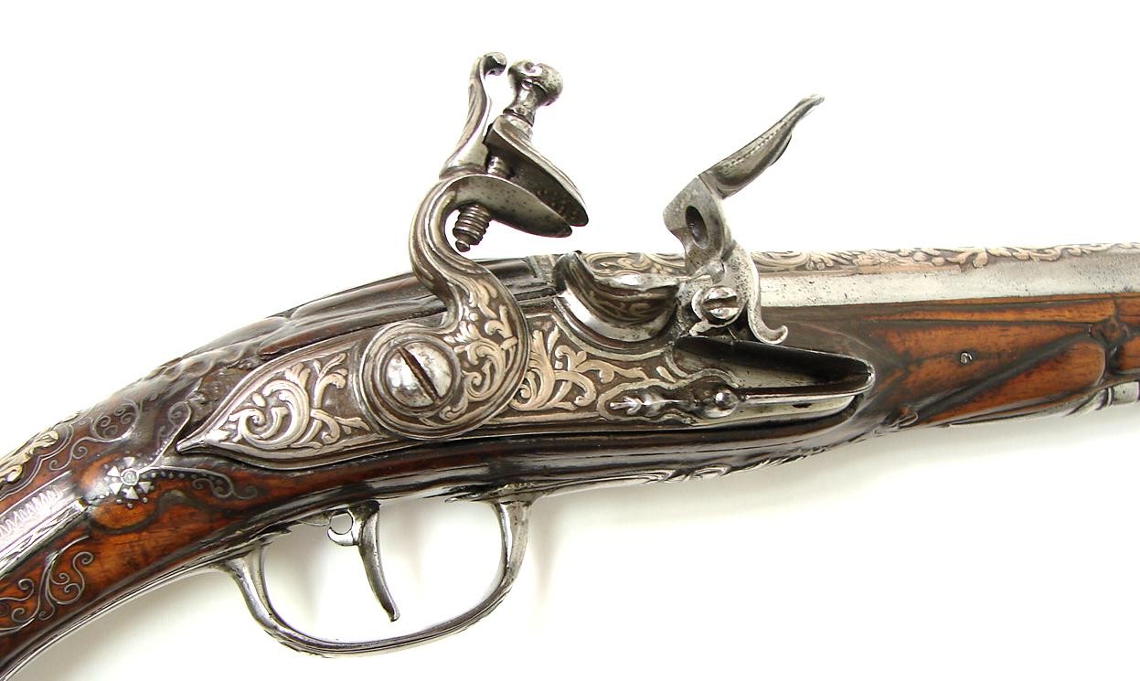 German Officers Circa 1750 pistols. The pair have carved stocks with ...