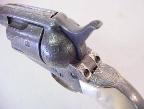 Colt Factory Engraved Single Action revolver with pearl grips and ...