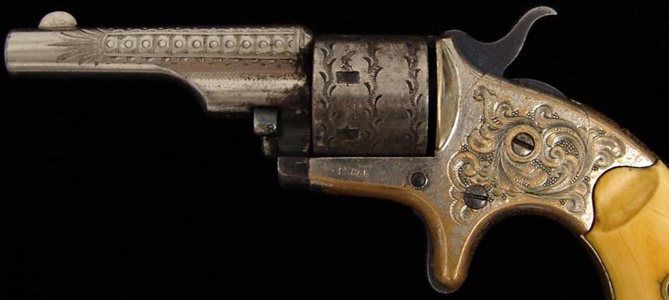 Colt Old Line .22 caliber revolver with silver cylinder. Engraved with ...