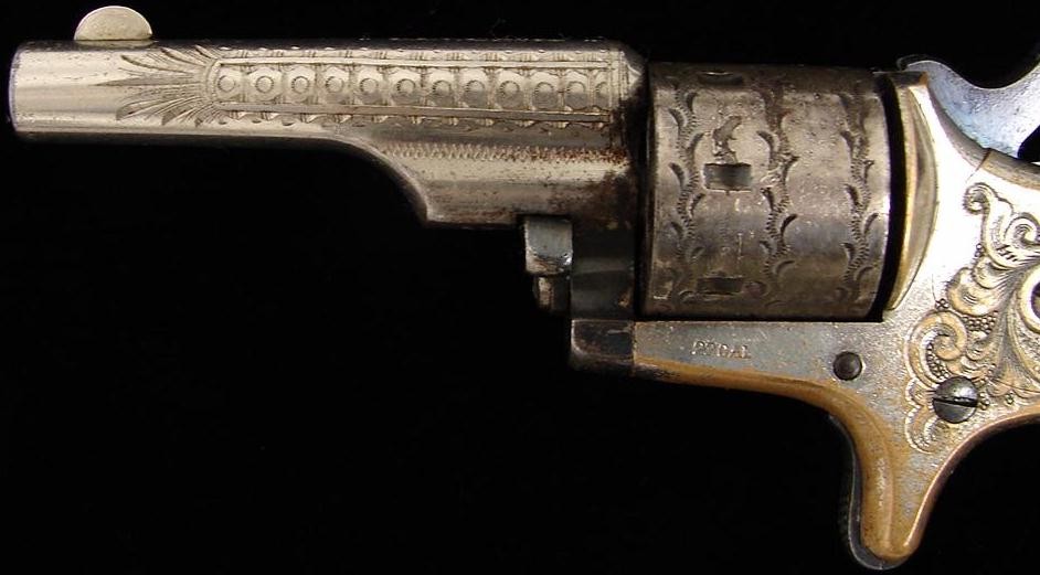 Colt Old Line .22 caliber revolver with silver cylinder. Engraved with ...