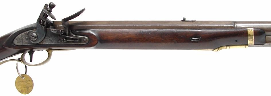 U.S. Model 1803 Harpers Ferry flintlock rifle dated 1814. Gun is near ...