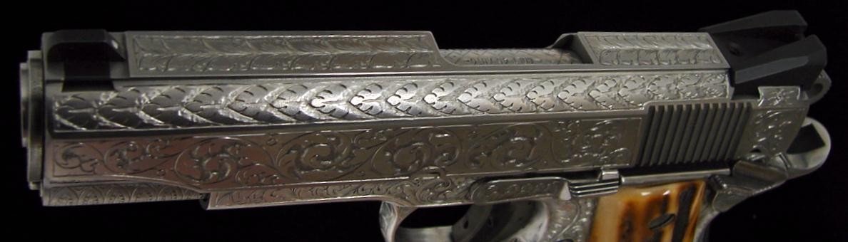 Colt Officers .45 ACP caliber pistol. Custom engraved XS model with ...