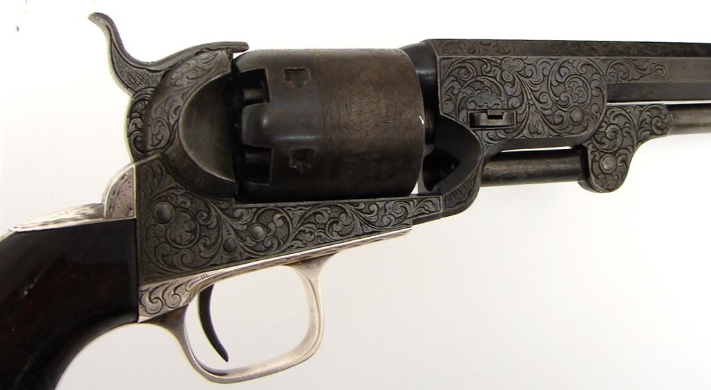 Colt 1851 Navy. This is factory engraved and has very good fancy ...