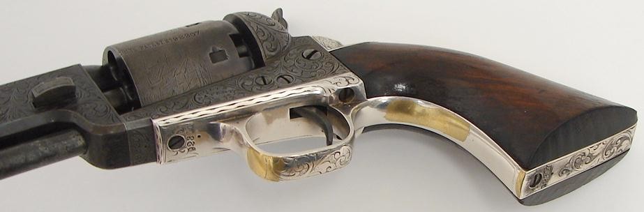 Colt 1851 Navy. This is factory engraved and has very good fancy ...