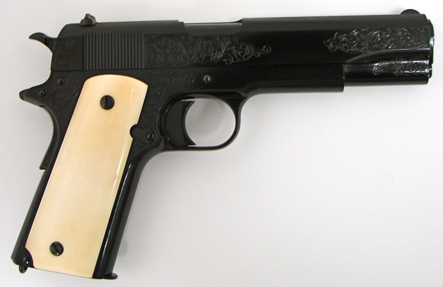 Colt 1911 .45ACP caliber pistol. Presentation grade factory engraved ...