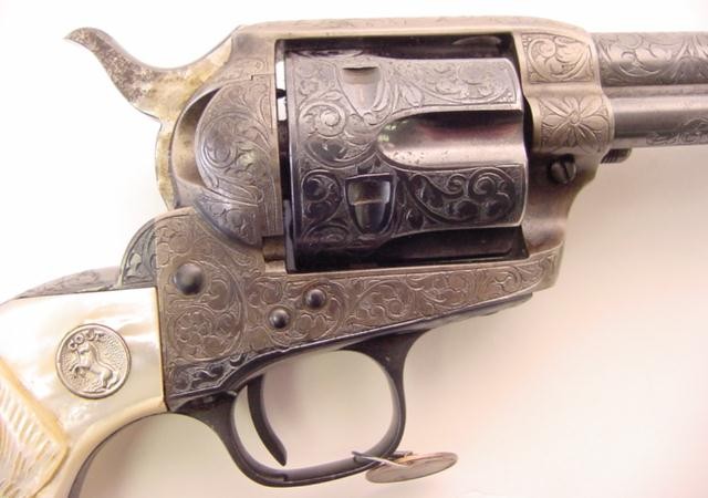 Colt Single Action 45 caliber revolver factory engraved with carved ...