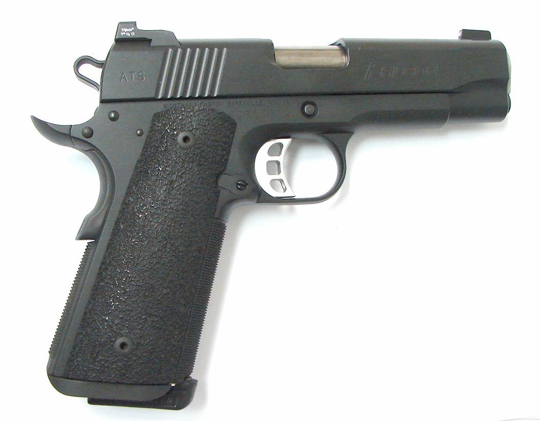 Nighthawk Custom Falcon .45 ACP caliber. 4 1/4" carry gun with Heinie ...