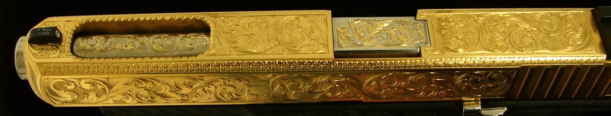 Glock 35 .40 S&W caliber pistol. Extra fancy custom engraved and gold ...