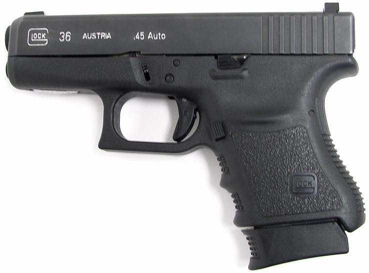 Glock 36 .45 ACP caliber pistol. Compact model with night sights ...