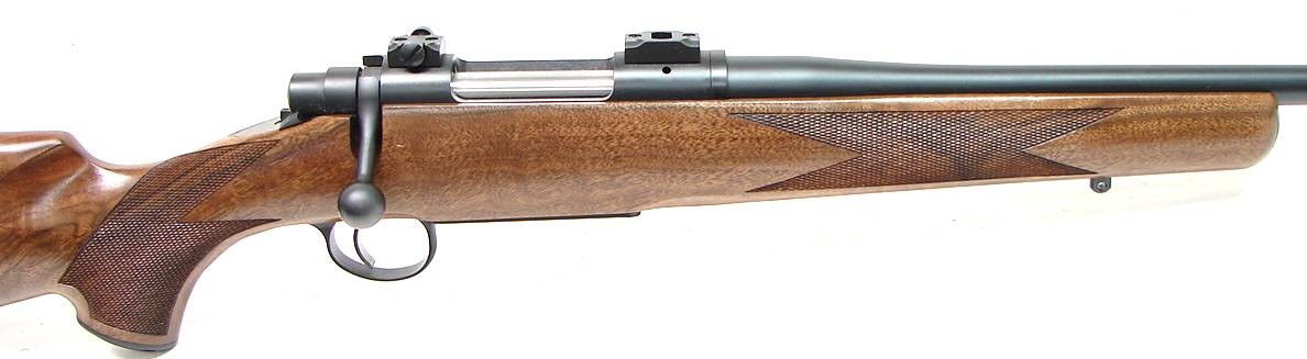 Cooper Arms .243 Win caliber rifle with oil finish, AA Claro wood, and ...