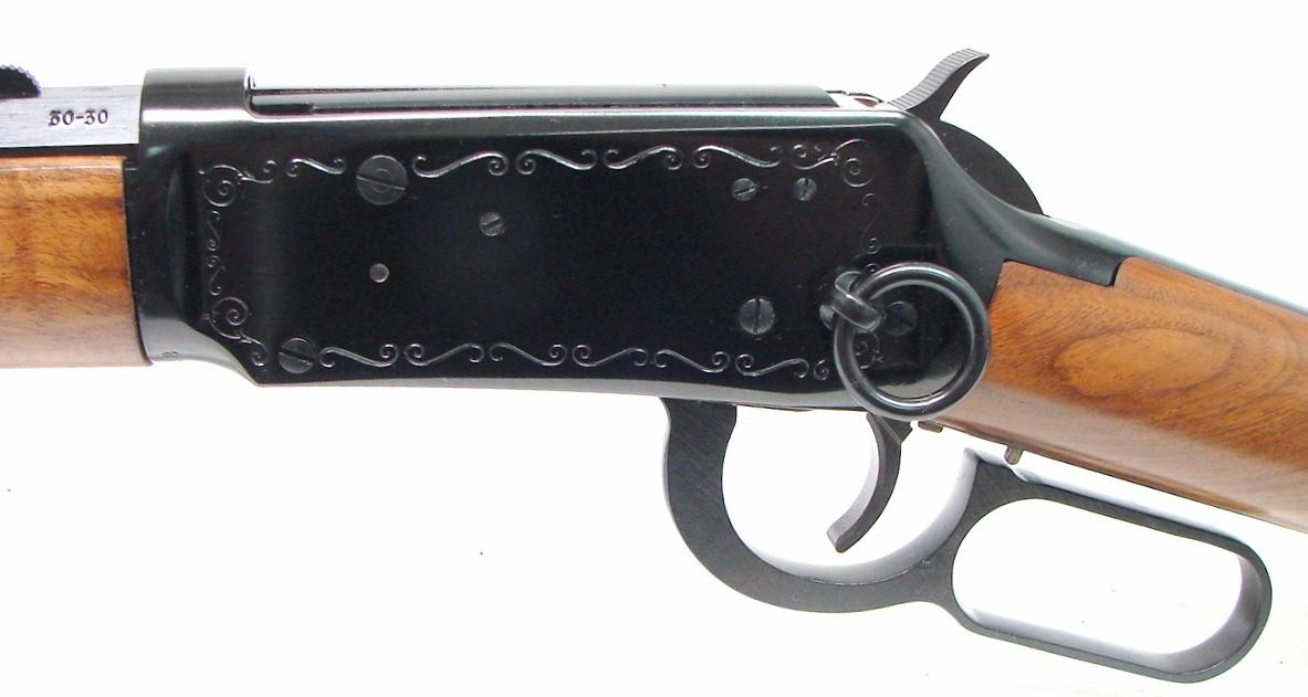 Winchester 94 .30-30 caliber rifle. Scarce Classic model with 20 octagon barrel, engraved ...