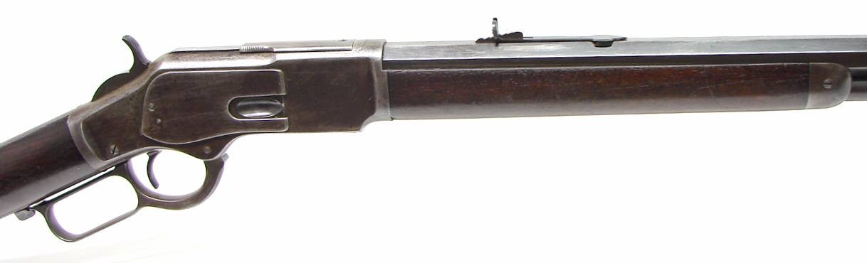 Winchester 1873 .40-40 caliber rifle. Manufactured approximately 1899. Bore is fair with some ...