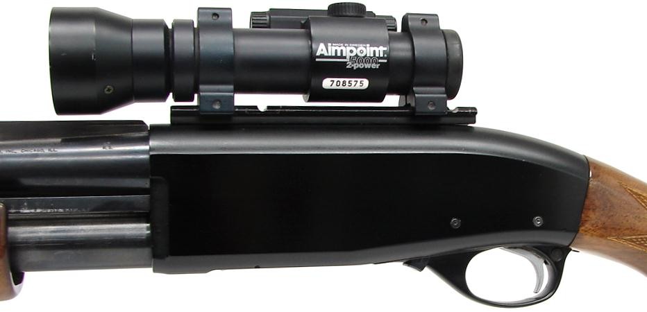 SKB 7300 12 gauge shotgun. Pump action slug gun with Aimpoint 5000 2x ...