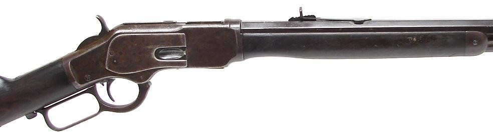 Winchester 1873 .38-40 caliber rifle. Old cowboy rifle with a very ...