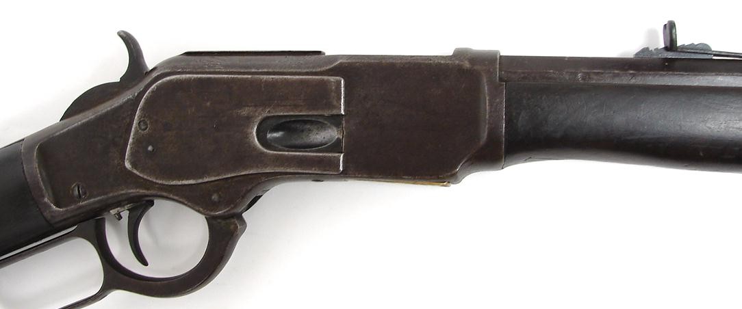 Winchester 1873 .38-40 caliber rifle. Old cowboy rifle with a very ...