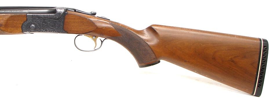 Ithaca 500 20 gauge shotgun. This is an over under field gun with 26 ...