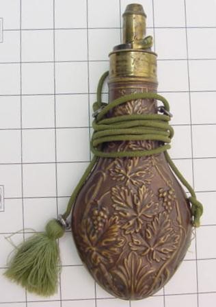 Unusual form large shotgun flask with grape vine leaves and grapes ...