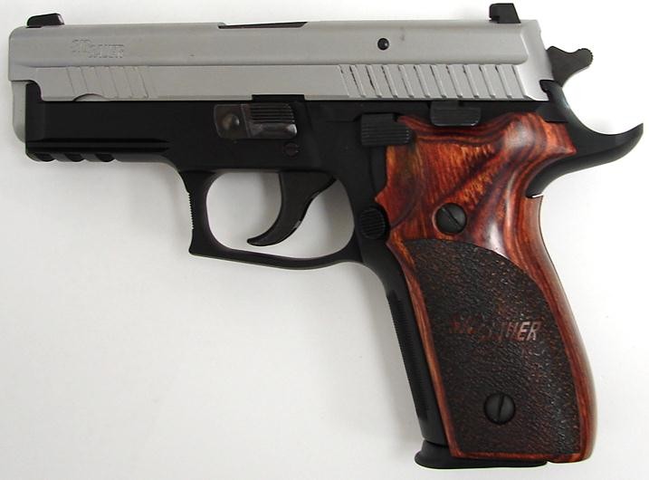 Sig-Sauer P229 Elite 9mm caliber pistol. Two-tone model with custom ...