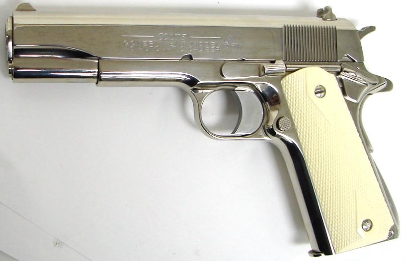 Colt Government Model .45 ACP caliber pistol. Custom nickel finish with ...