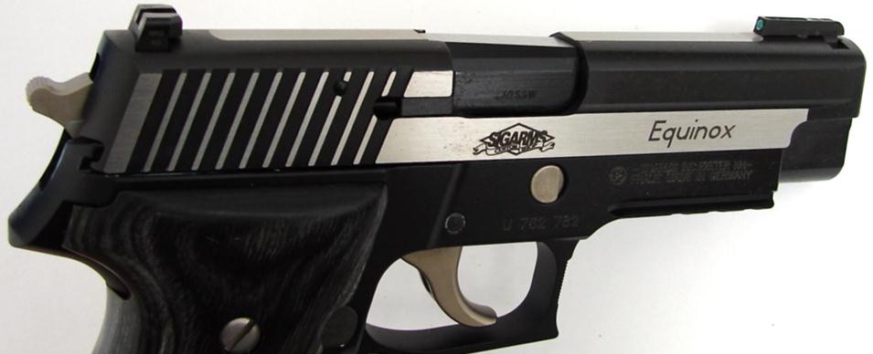 Sig-Sauer P226 Equinox .40 S&W caliber pistol. Custom shop model with wood grips and night ...