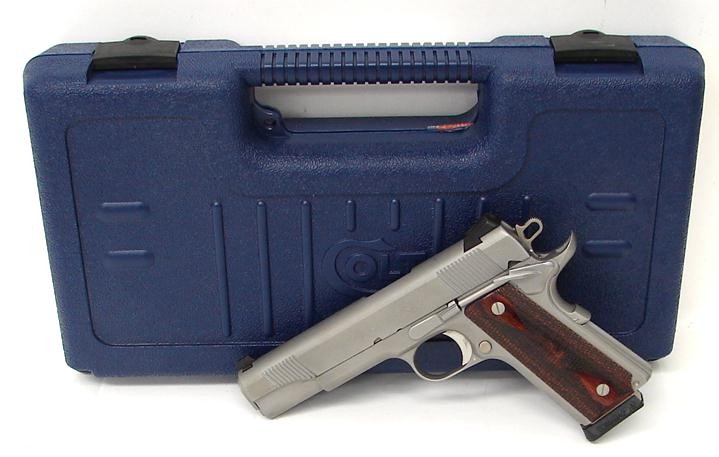 Colt Government Model .45 ACP caliber pistol. Stainless steel Gunsite ...