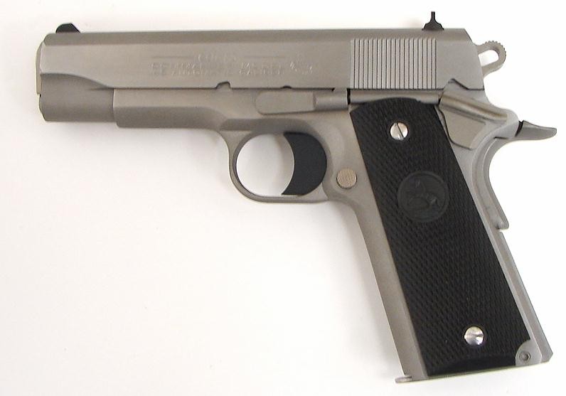 Colt Commander .45 ACP caliber pistol. Stainless steel classic model ...
