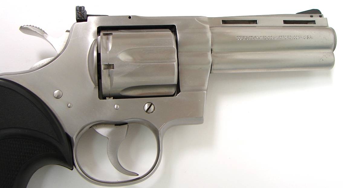 Colt Python .357 Mag caliber revolver. Scarce 4" stainless steel model ...