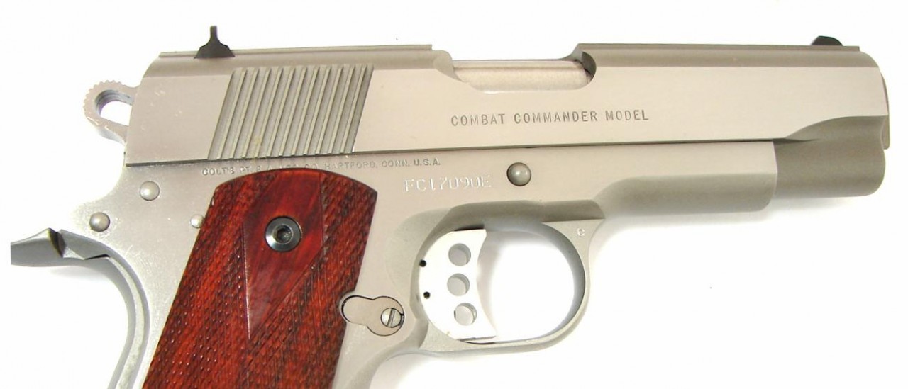 Colt Combat Commander .45 ACP caliber pistol. Stainless steel model ...
