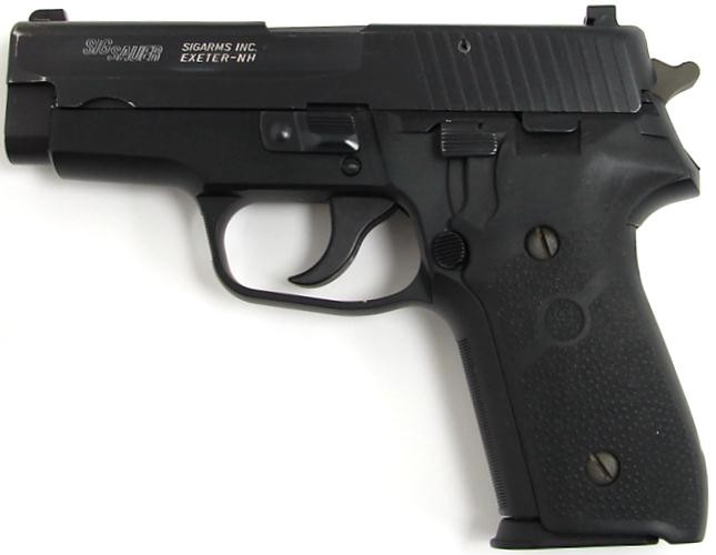 Sig-Sauer P228 9mm Para caliber pistol. Compact model with night sights ...