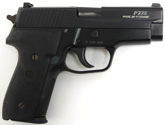 Sig-Sauer P228 9mm Para caliber pistol. Compact model with night sights ...
