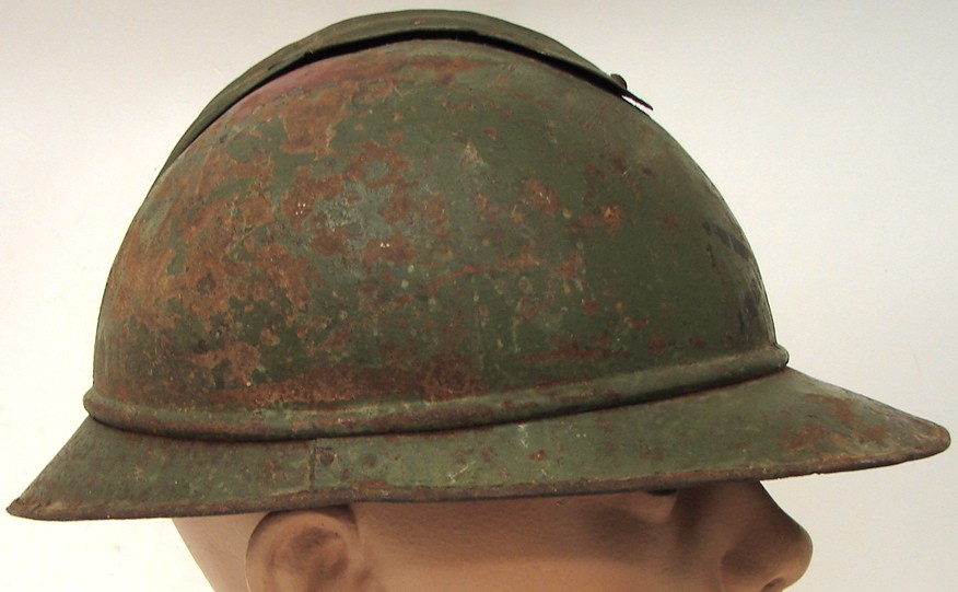 French Model 1915 Adrian Helmet. Artillery emblem on front. Poor ...
