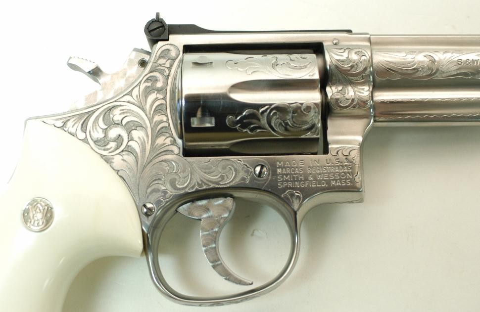 Smith & Wesson Model 66 357 Magnum caliber revolver engraved and ...