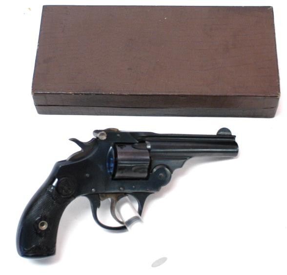 Iver Johnson 32 caliber revolver with oil bottle, brush and instruction ...