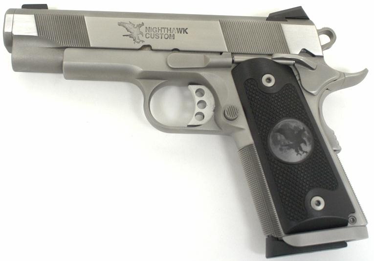 Nighthawk Custom Predator III .45 ACP caliber pistol with 4 weighted ...