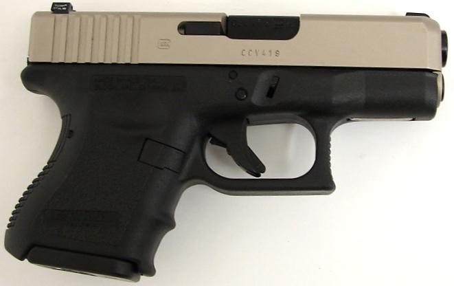 Glock 26 9mm Para caliber pistol. Sub-compact model with custom nickel ...