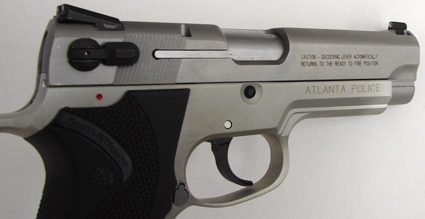 Smith & Wesson 4003TSW .40 S&W caliber pistol. Tactical model with ...