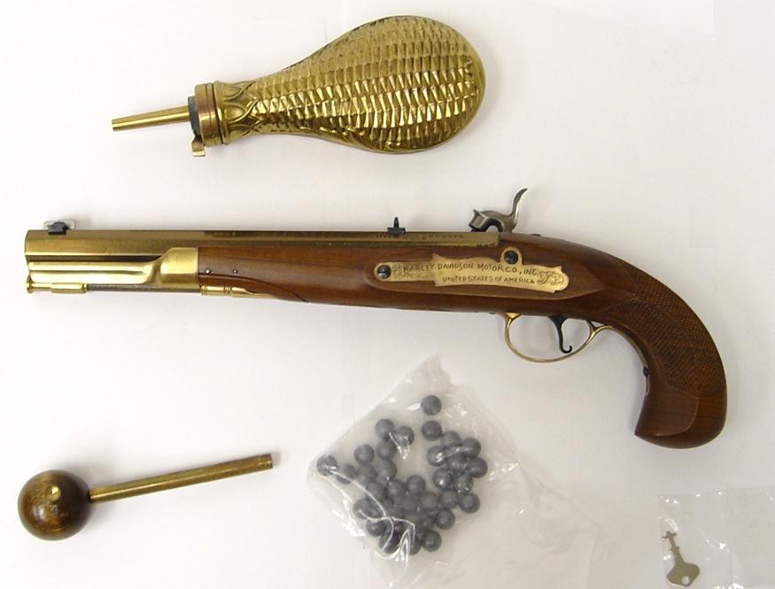 Harley Davidson special edition black powder pistol. Comes with ...