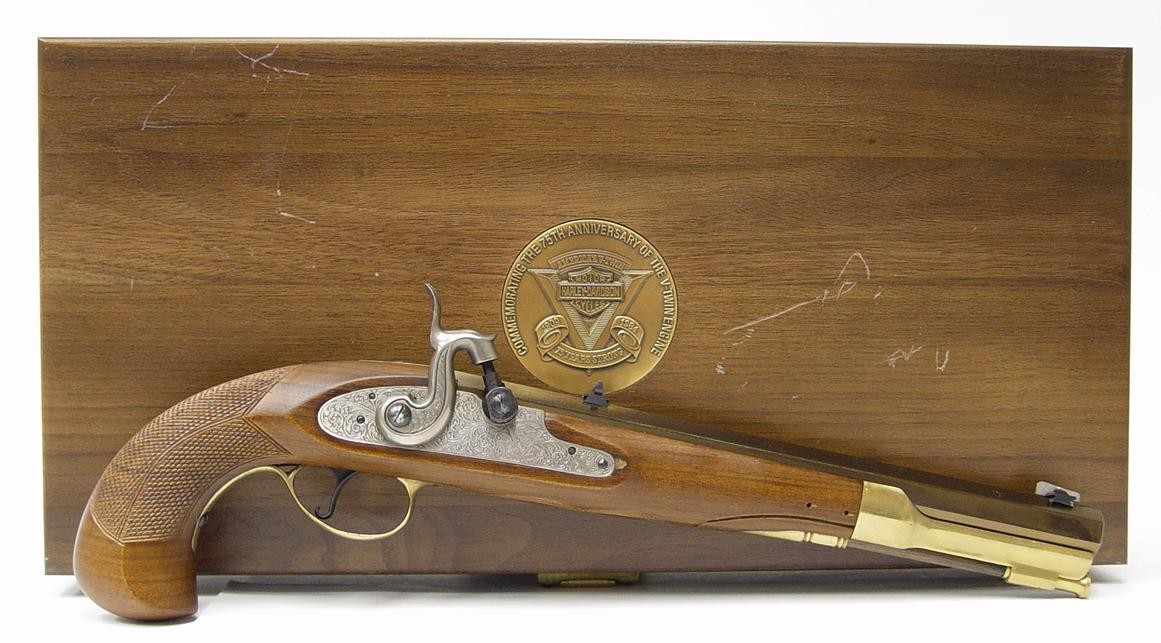 Harley Davidson special edition black powder pistol. Comes with ...