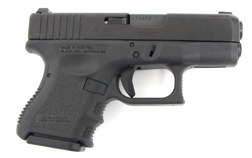 Glock 27 .40 S&W caliber pistol. Sub-compact model with night sights ...