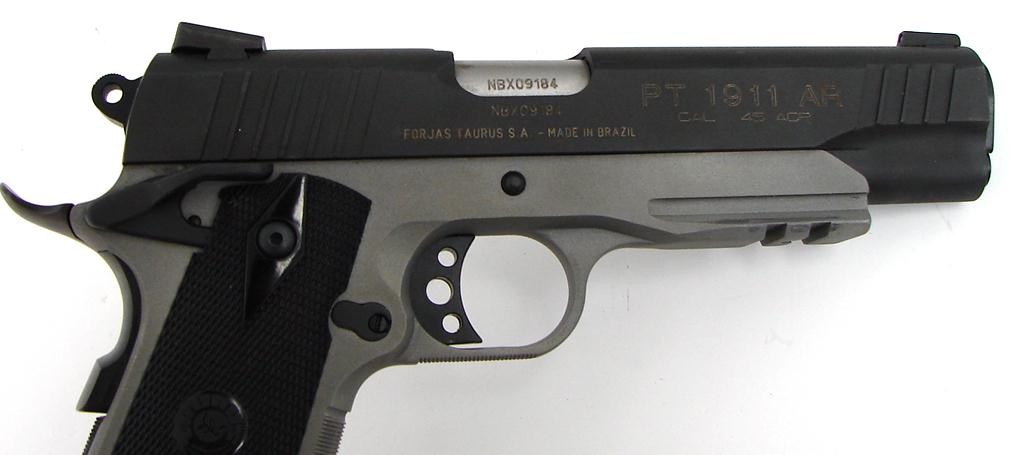 Taurus PT 1911 AR .45 ACP caliber pistol. Two-tone model with light ...