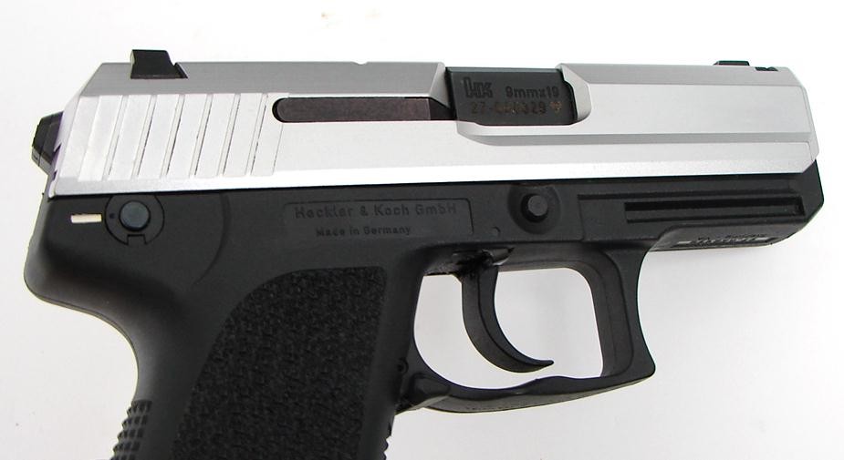 Heckler & Koch USP Compact 9mm Para caliber pistol. Stainless steel ...