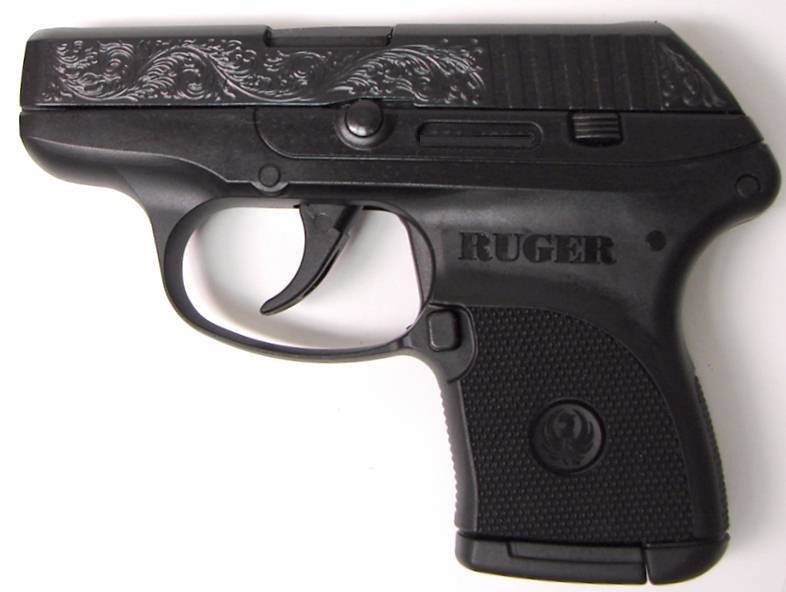 Ruger LCP 380 ACP caliber pistol. Engraved pocket model with black ...