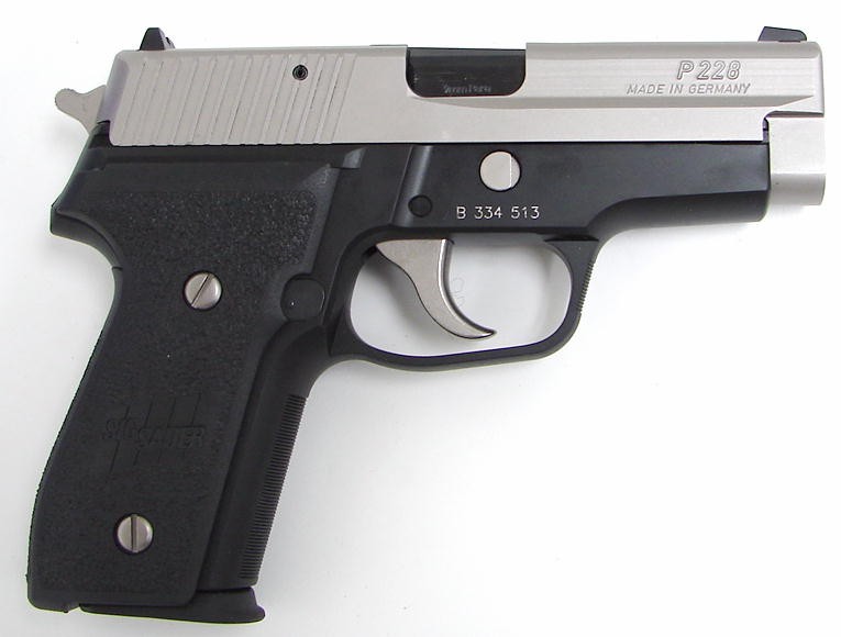 Sig-Sauer P228 9mm caliber pistol. Special edition November gun of the ...