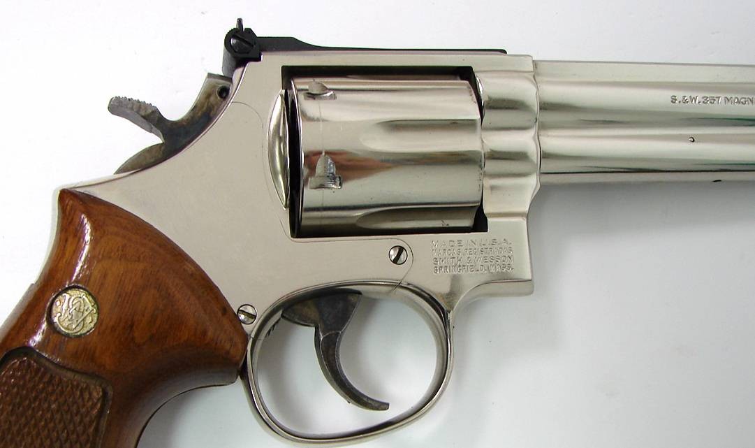 Smith & Wesson 586 .357 Mag caliber revolver. Excellent condition 6" barrel nickel plated 1980s ...
