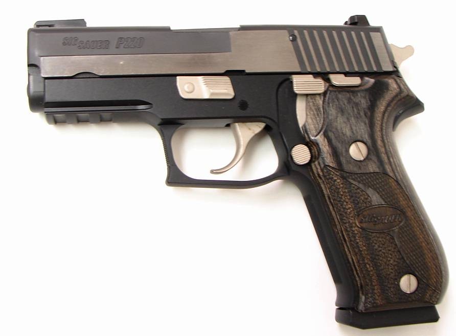 Sig Sauer P220 Equinox .45 ACP caliber pistol. "Carry" model with 3.9 ...