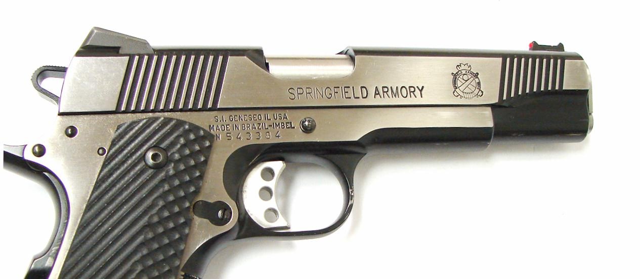 Springfield 1911A1 9mm caliber pistol. Springfield Armory "Loaded ...