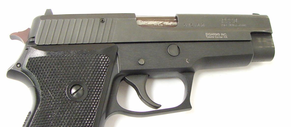 Sig Sauer P220 .45 ACP caliber pistol. Full size older model with ...