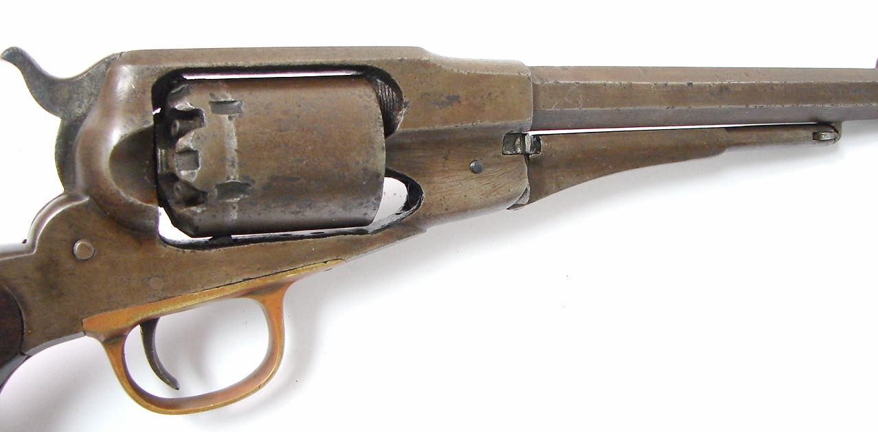 Remington New Navy revolver. Metal has light brown patina with spots of ...