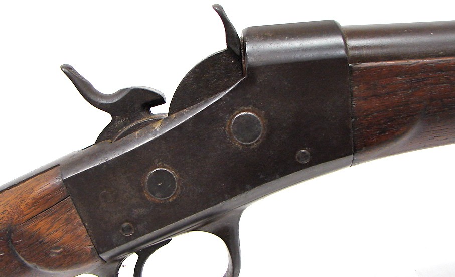 Remington Rolling Block 12 gauge shotgun. Smooth brown patina on metal ...