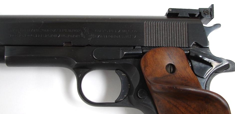 Colt Government Model .45 ACP caliber pistol. Custom bullseye target ...